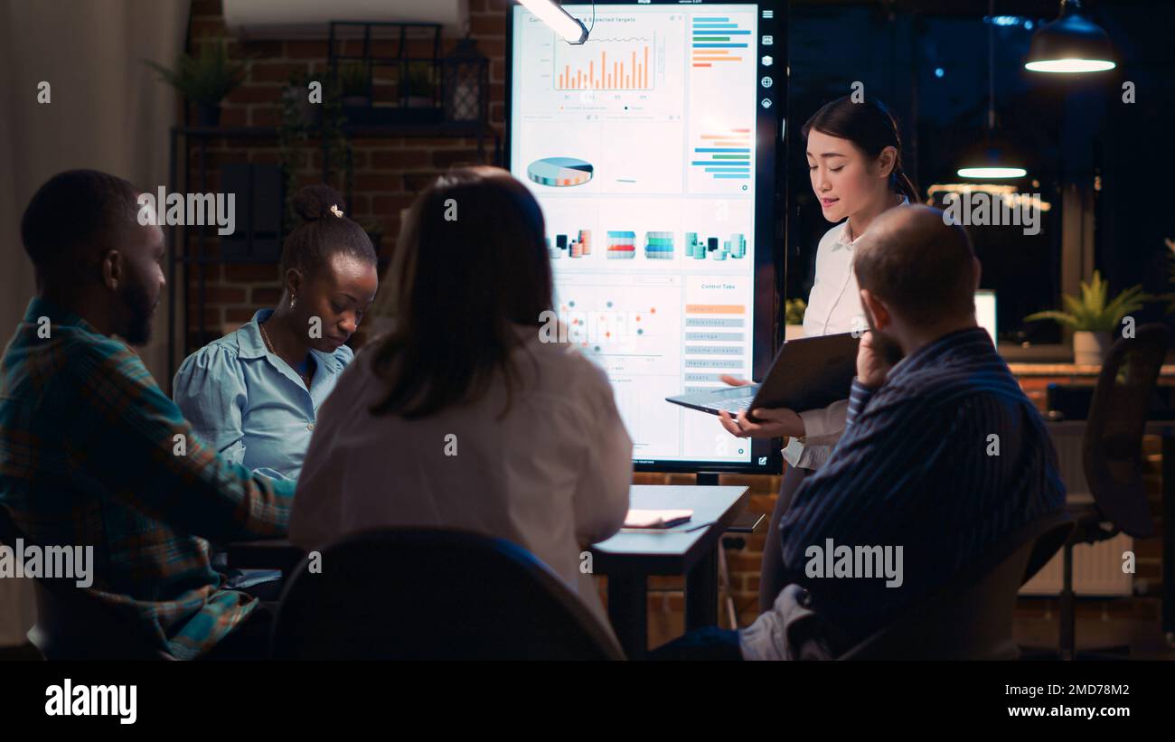 Asian employee presenting analytics research hi-res stock photography ...