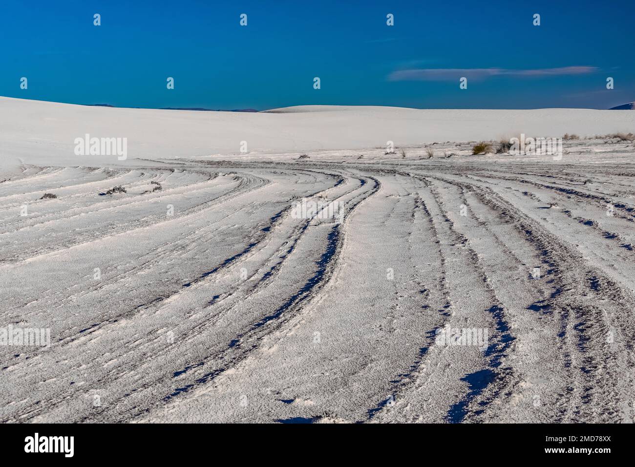 Hard ridges of sand between blowing dunes in the gypsum dunes of White ...