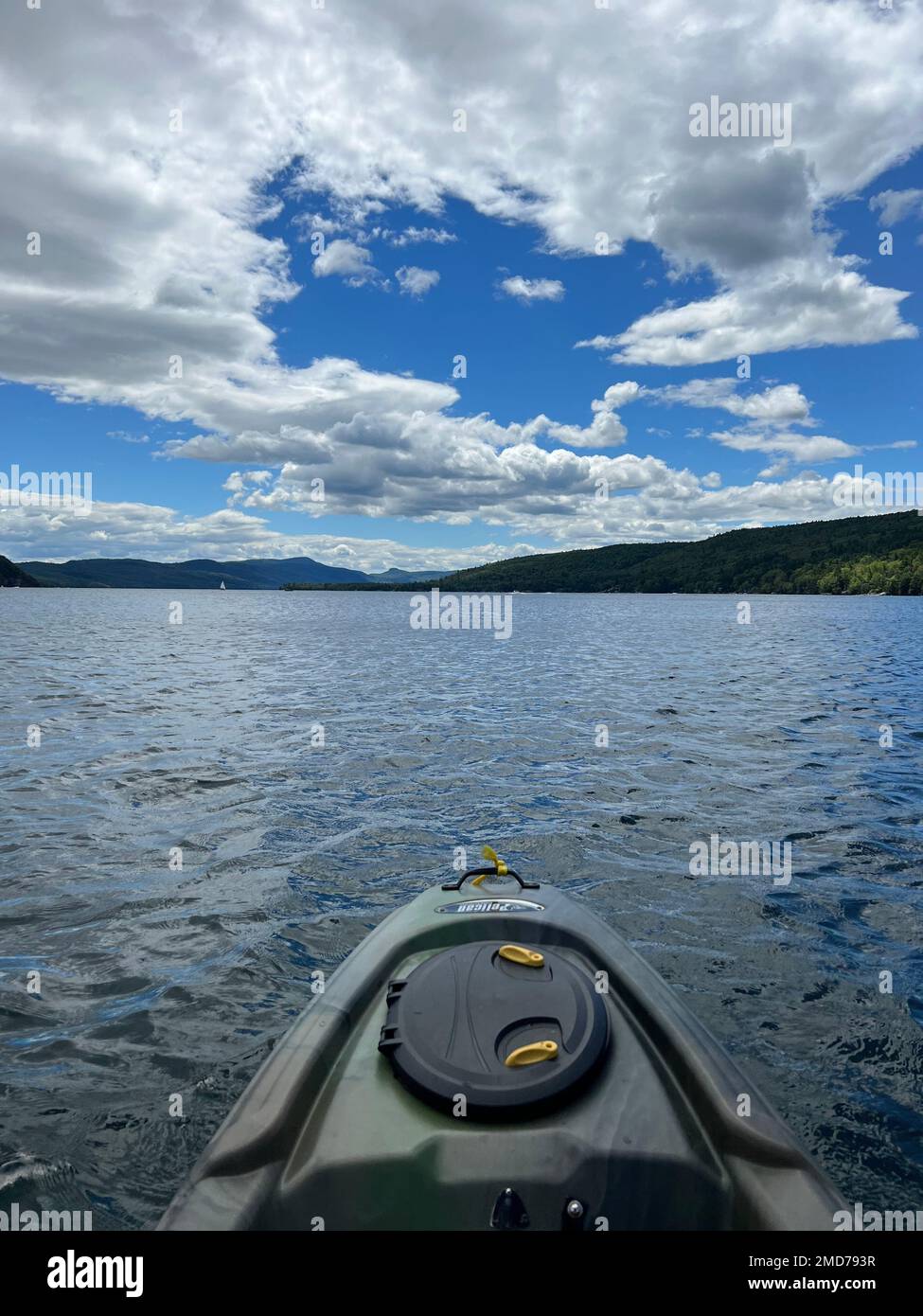 A vertical of the beautiful blue seascape captured from a boat under ...