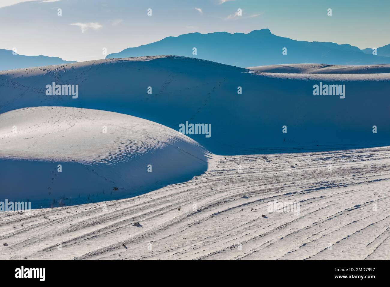 Hard ridges of sand between blowing dunes in the gypsum dunes of White ...