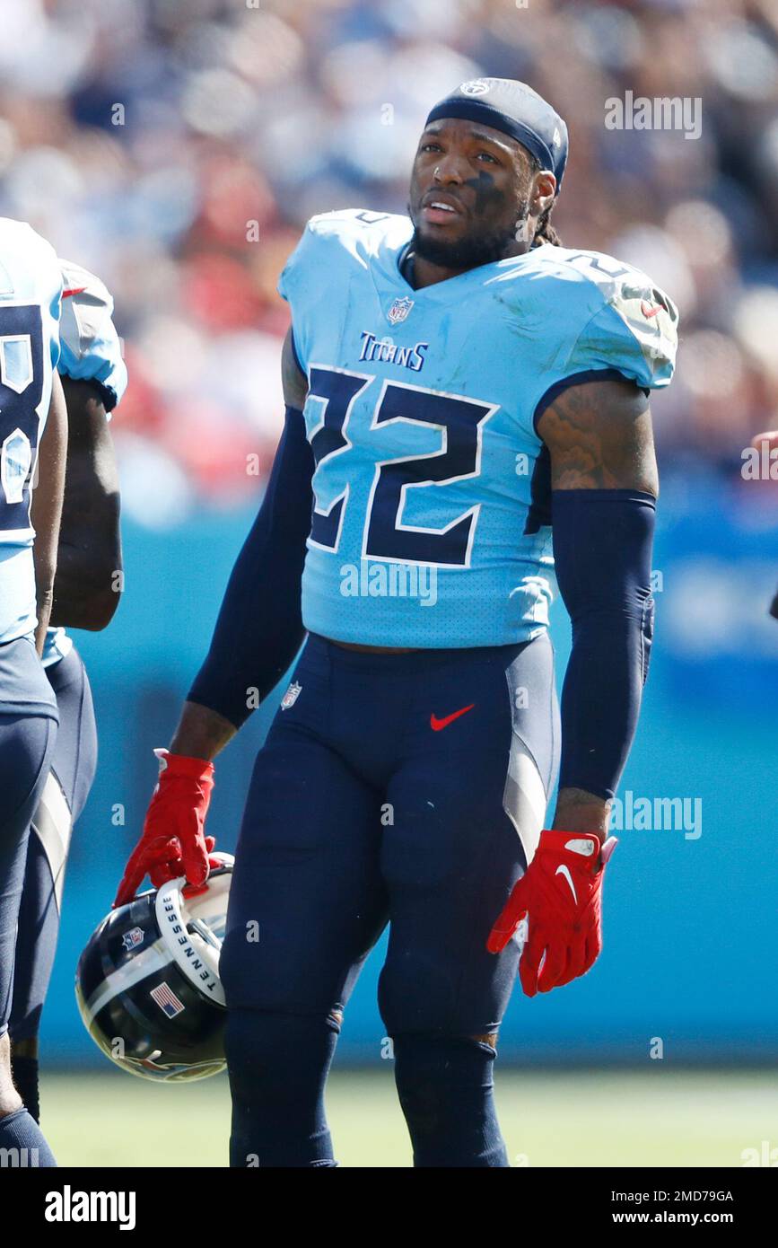 Tennessee Titans running back Derrick Henry (22) takes a break in the ...