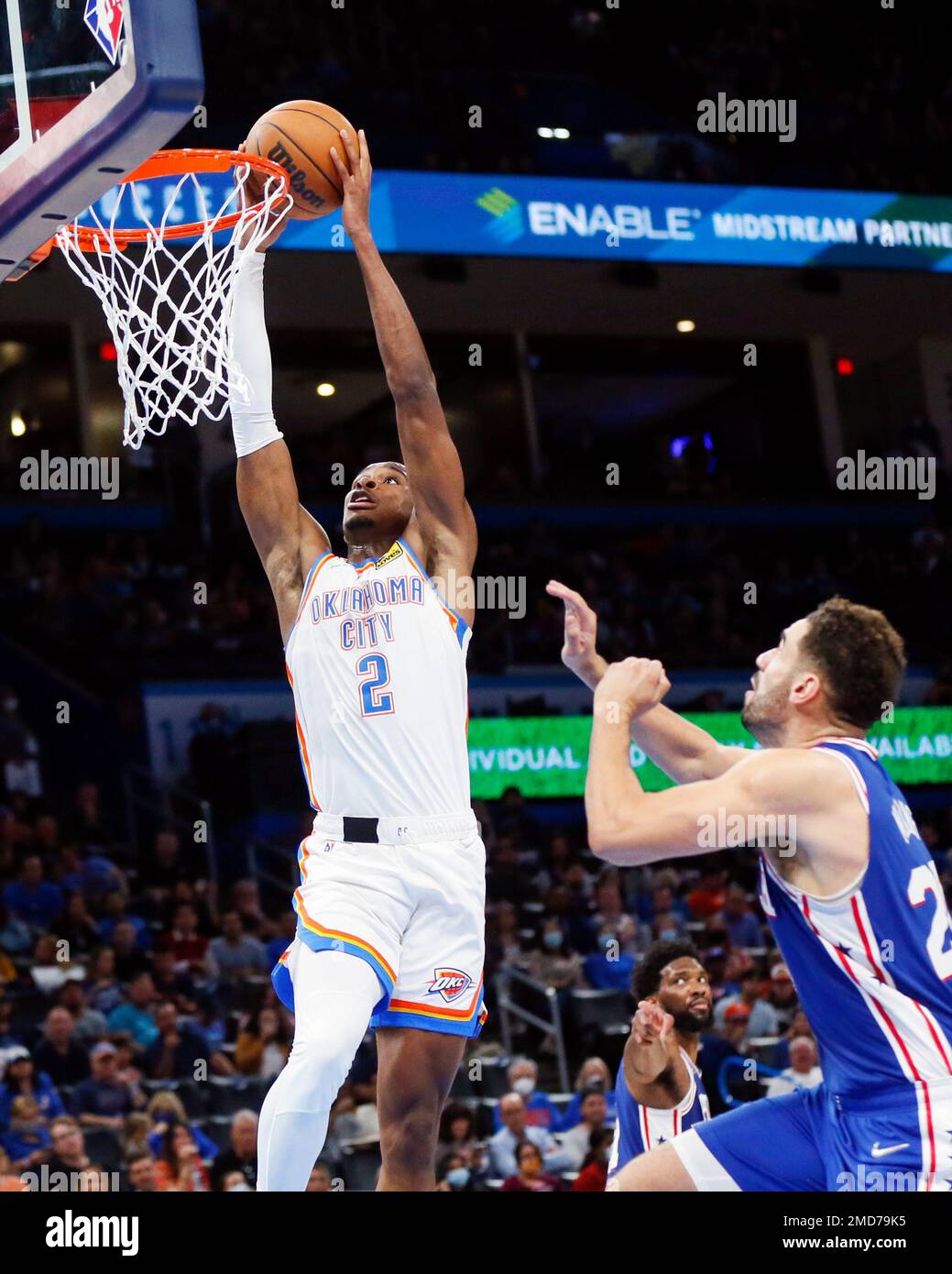 Oklahoma City Thunder guard Shai Gilgeous-Alexander (2) dunks next to ...
