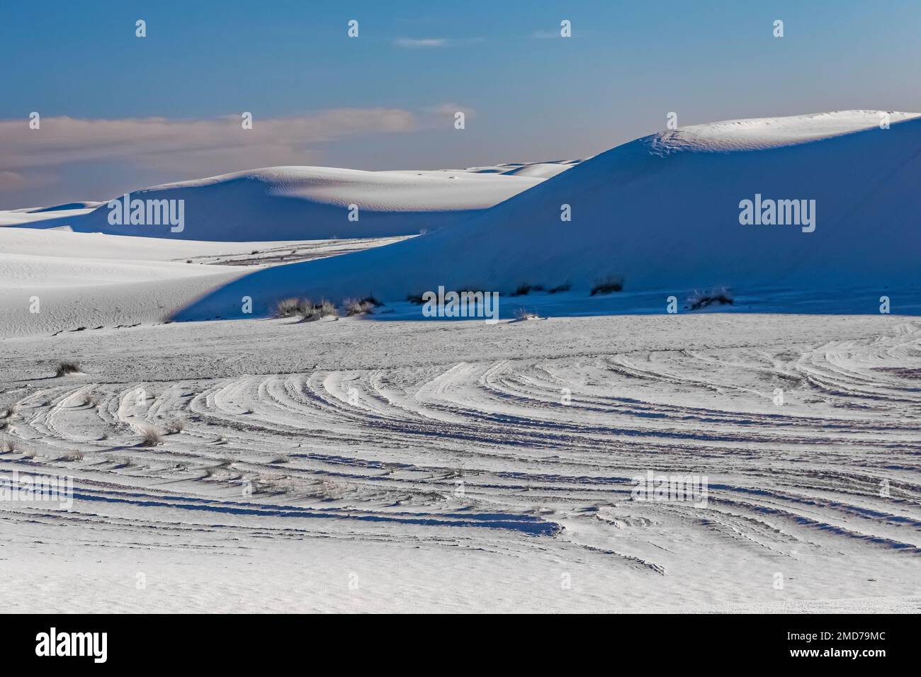 Hard ridges of sand between blowing dunes in the gypsum dunes of White ...
