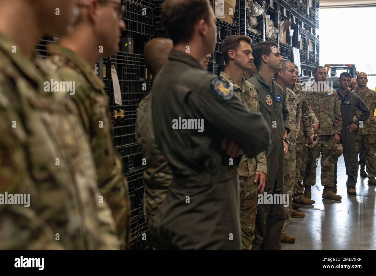 U.S. Air Force Airmen assigned to the 23rd Wing stand in line to pick ...