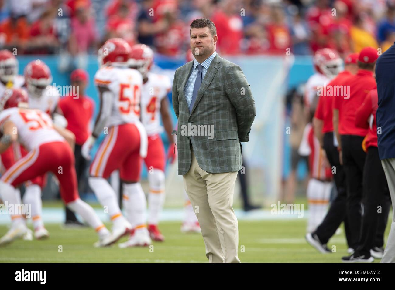 Tennessee Titans general manager Jon Robinson watches as players warm ...