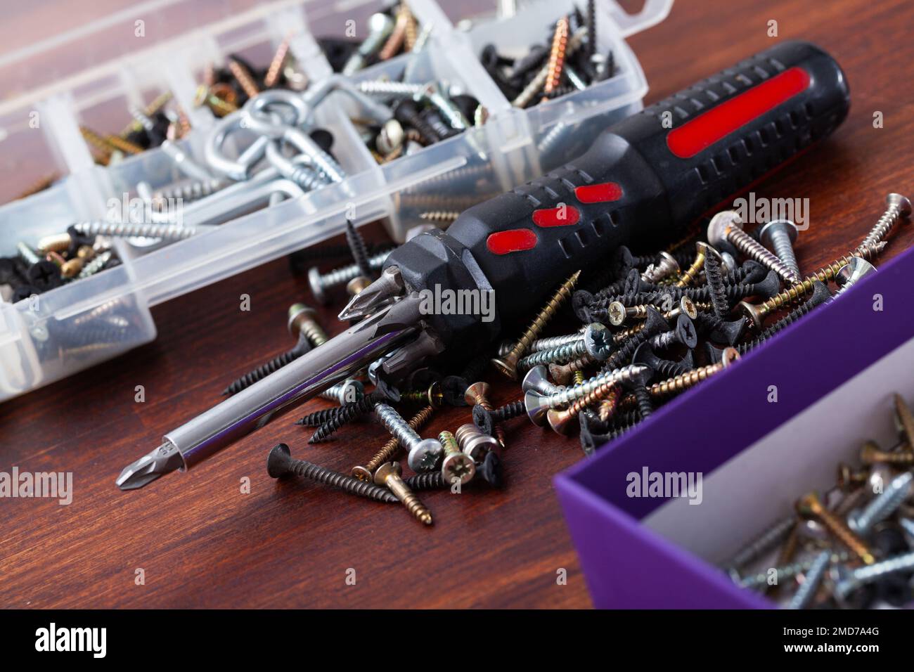 Tool box and set of screws and screwdriver Stock Photo - Alamy