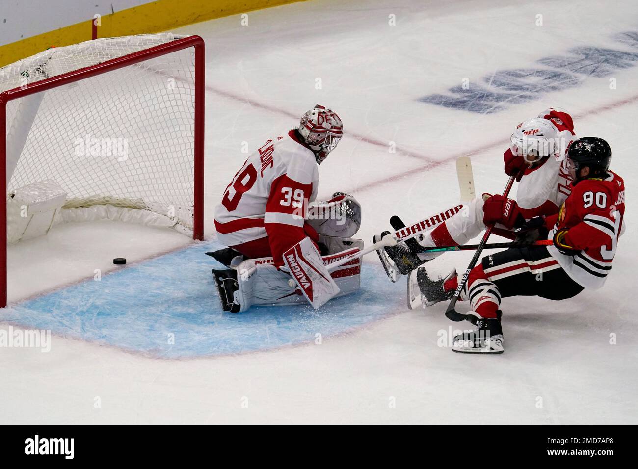 Chicago Blackhawks center Tyler Johnson (90) scores against Detroit Red ...