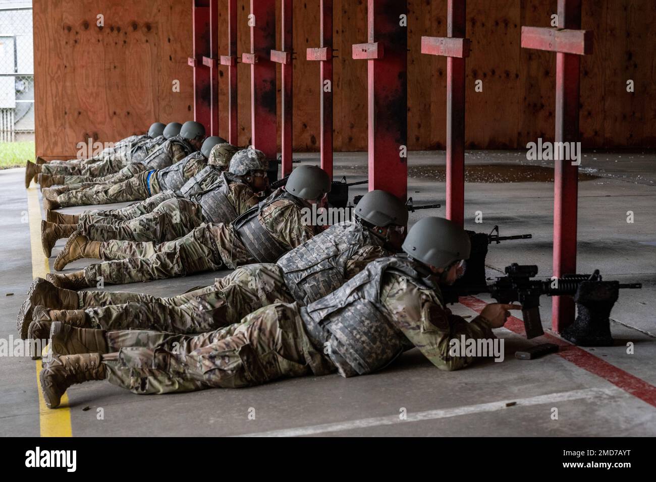 U.S. Air Force Airmen assigned to the 23rd Wing shoot M4 carbine rifles ...