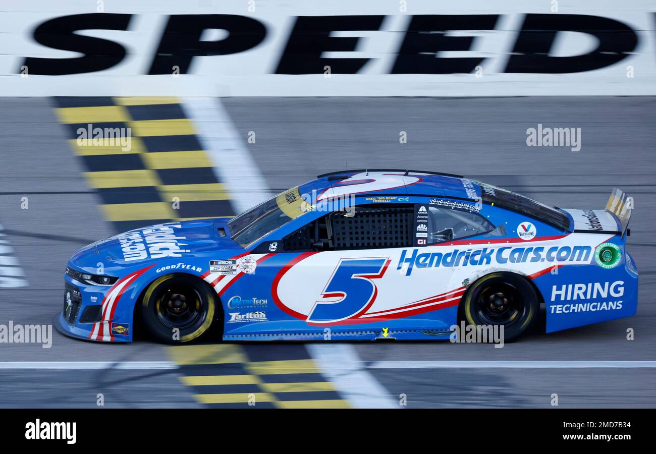 Kyle Larson (5) crosses the finish line to win a NASCAR Cup Series auto ...