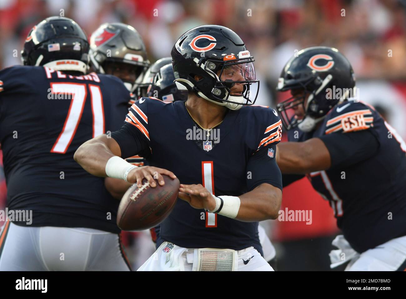 Chicago Bears quarterback Justin Fields (1) looks to pass against the ...