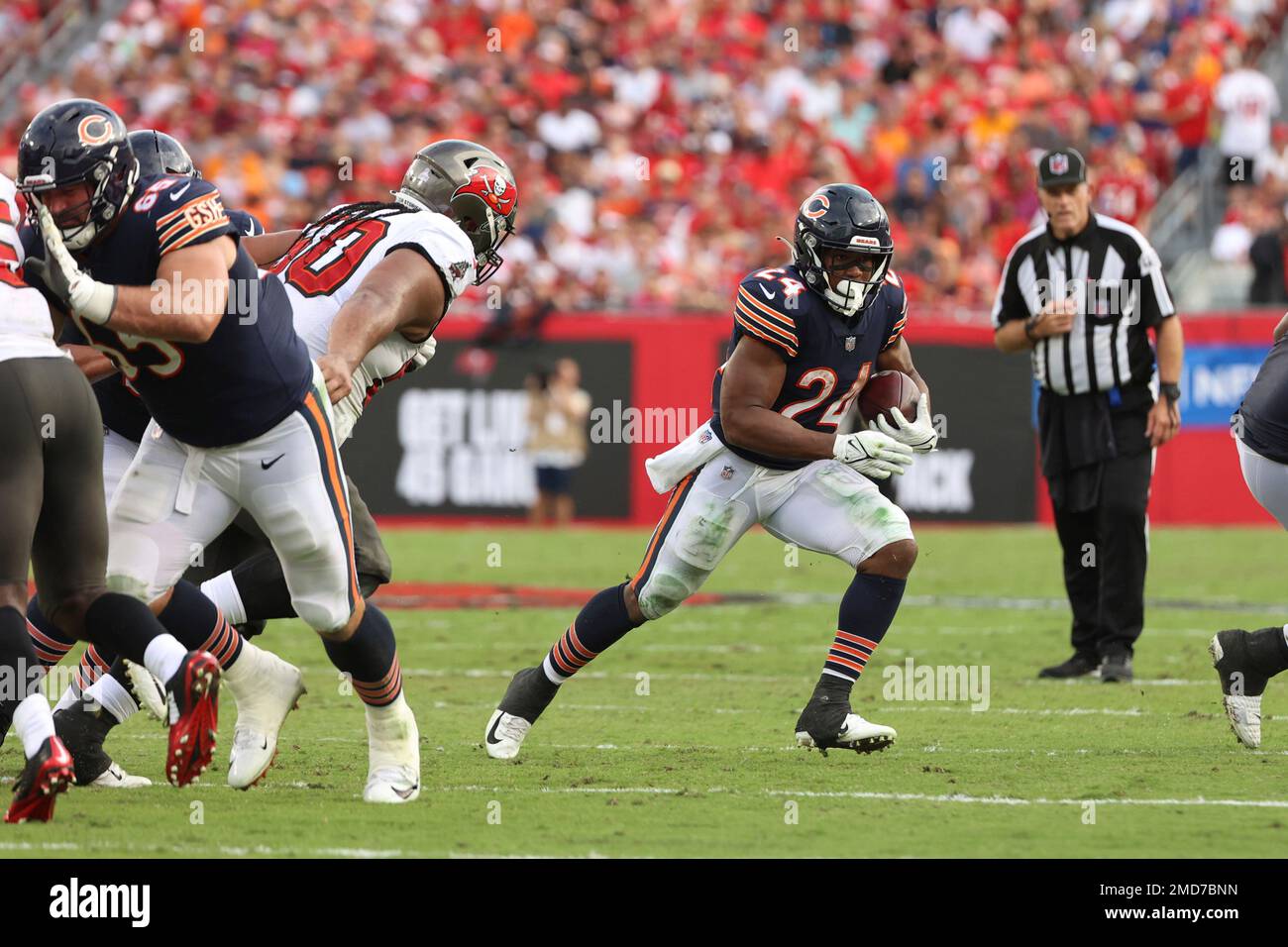 Chicago Bears running back Khalil Herbert (24) rushes the ballan NFL ...