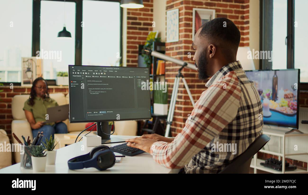 Male App Developer Using Html Script Code On Computer Programming New User Interface On
