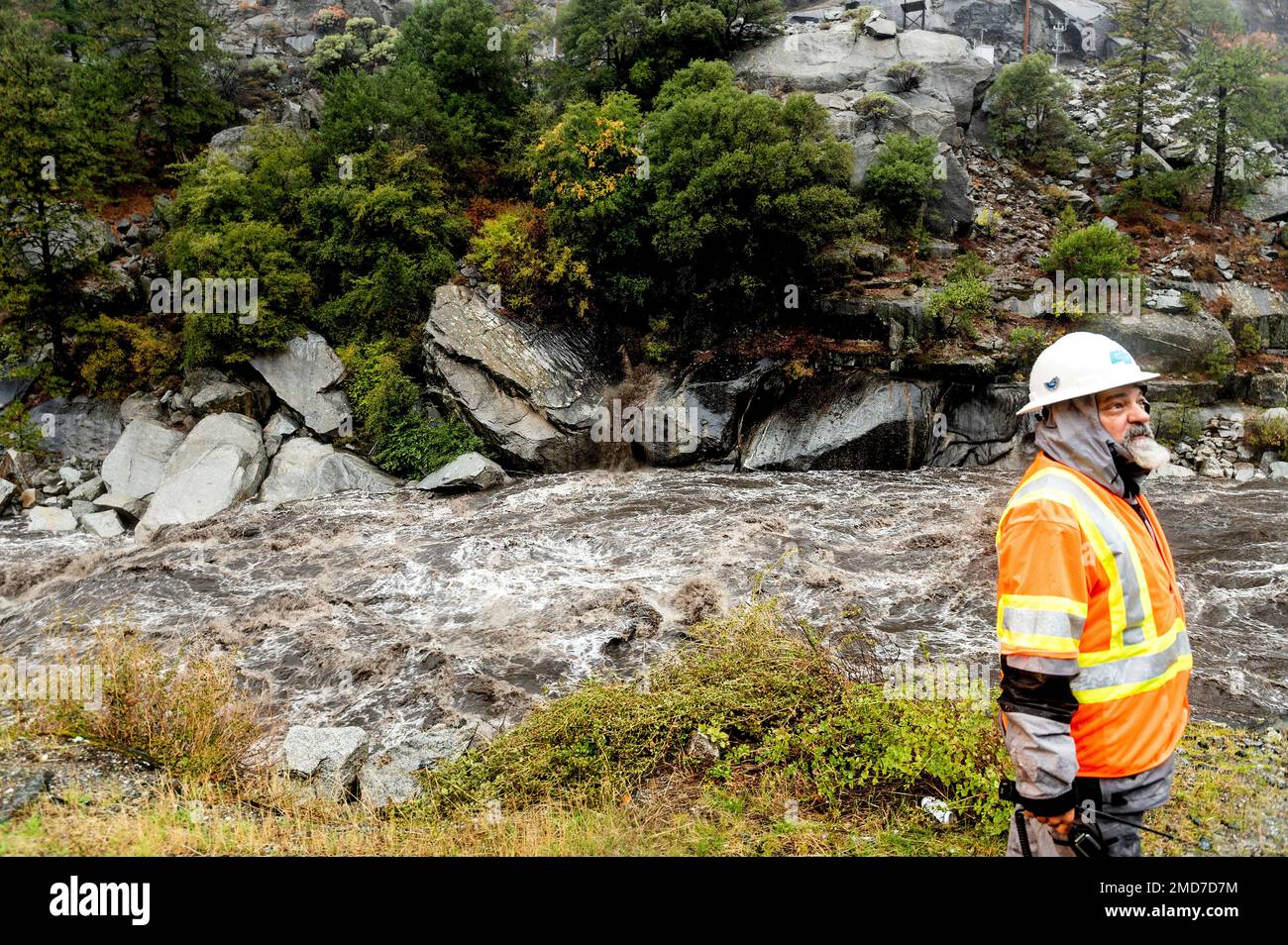 Caltrans maintenance supervisor Matt Martin surveys a landslide ...