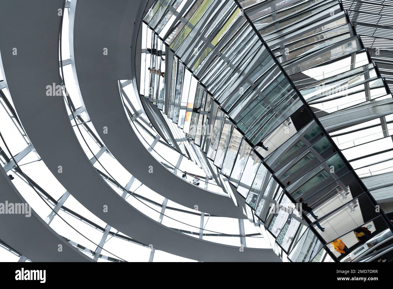 Inside the Bundestag dome. Tourists visit the parliament building of ...