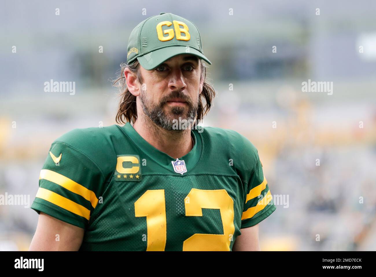 Green Bay Packers' Aaron Rodgers walks off the field after an NFL ...