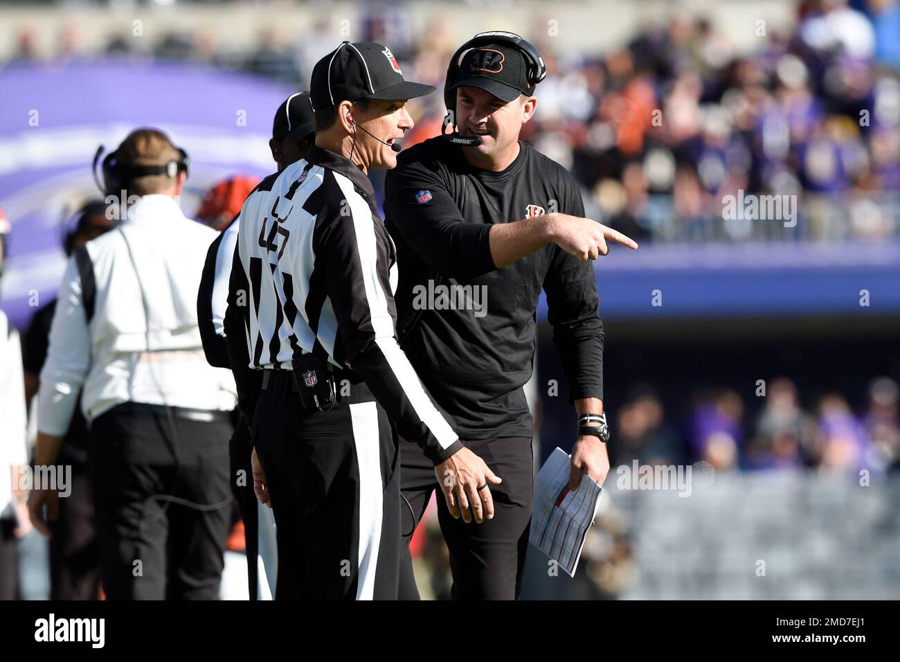 Cincinnati Bengals head coach Zac Taylor, right, talks with line judge ...