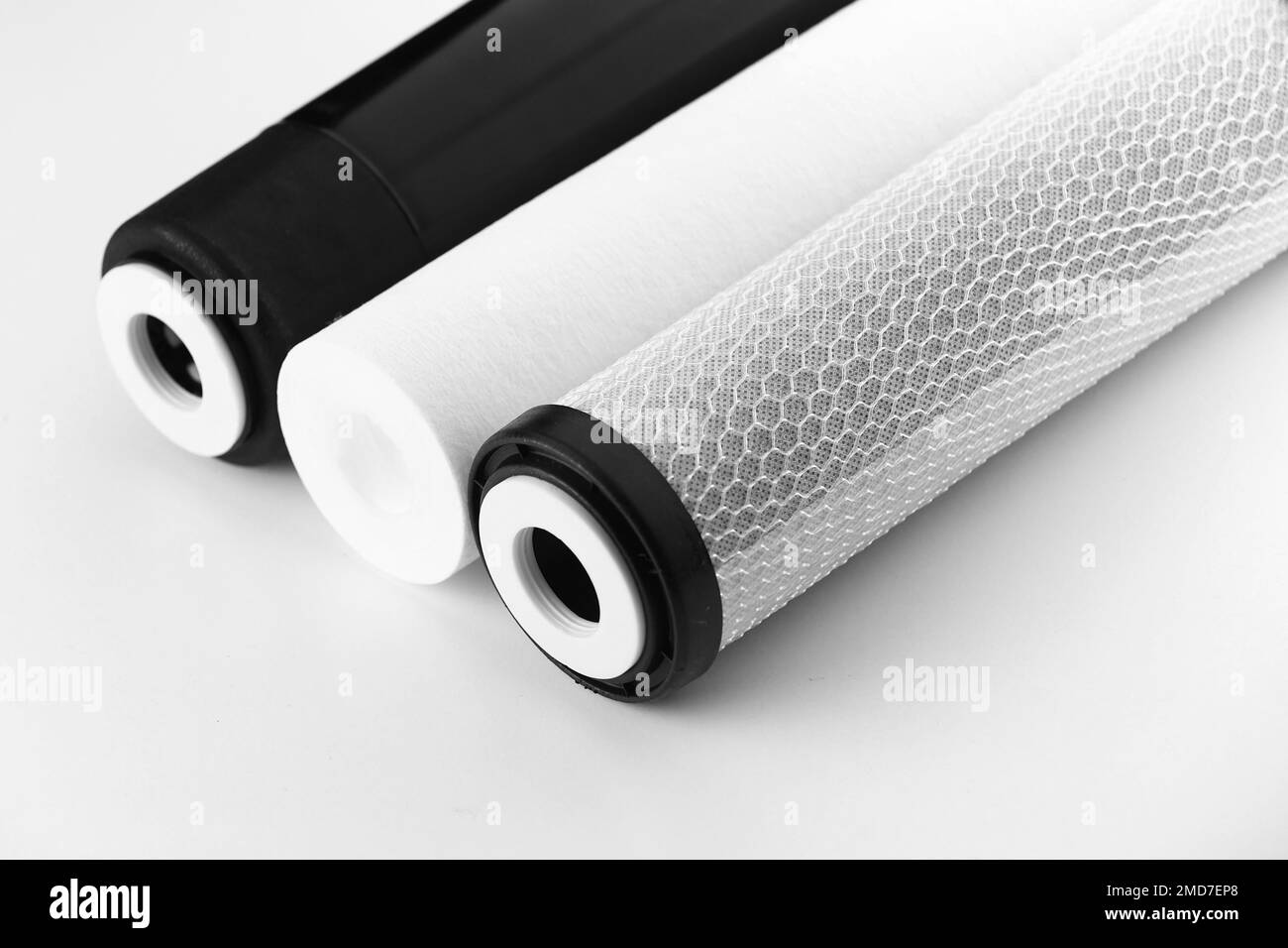 Cropped three filter cartridges for house water filtration system ...