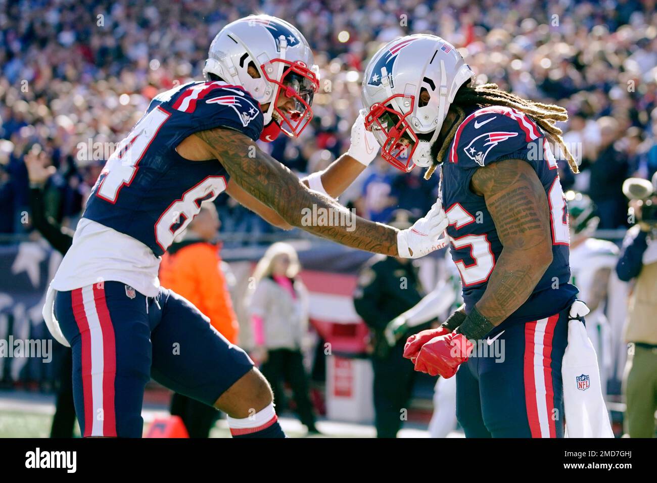 New England Patriots running back Brandon Bolden, right, is ...