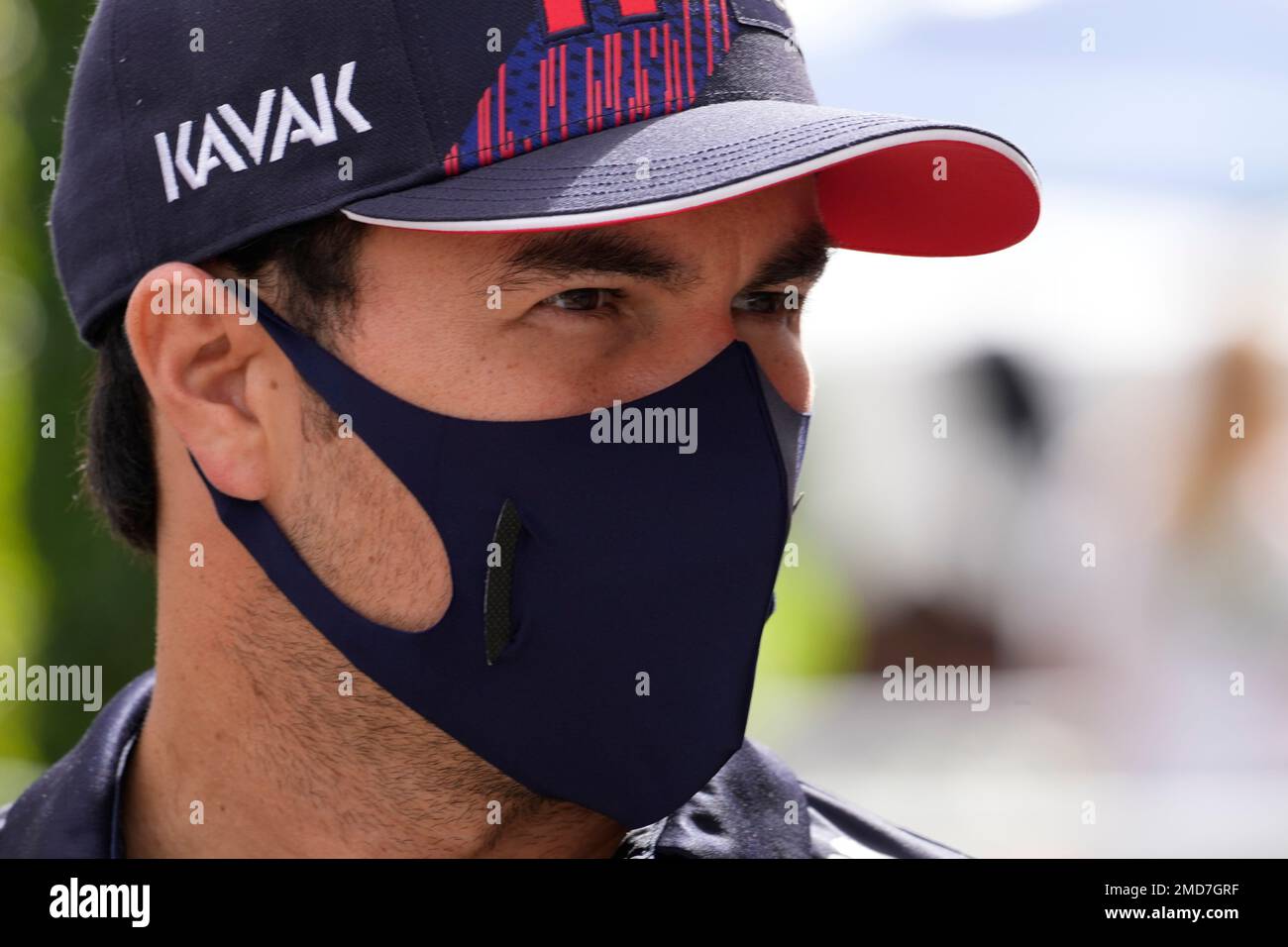 Red Bull driver Sergio Perez, of Mexico, arrives for the the Formula ...