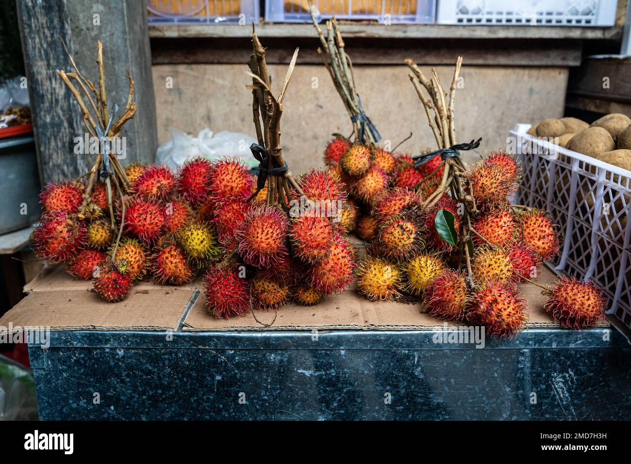 Fresh rambutan fruit sold at the market in daylight, horizontal Stock ...