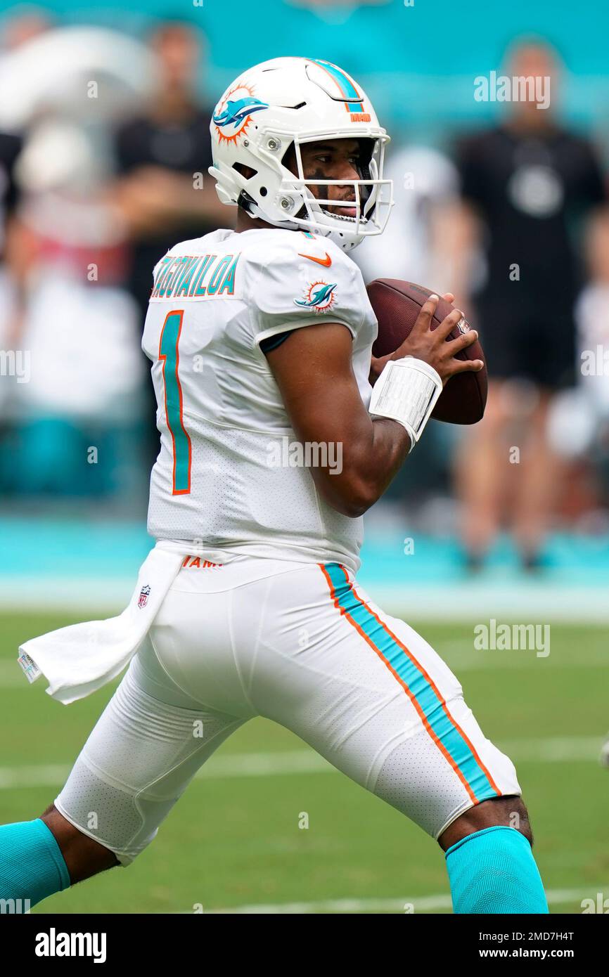 Miami Dolphins quarterback Tua Tagovailoa (1) looks to pass during the ...