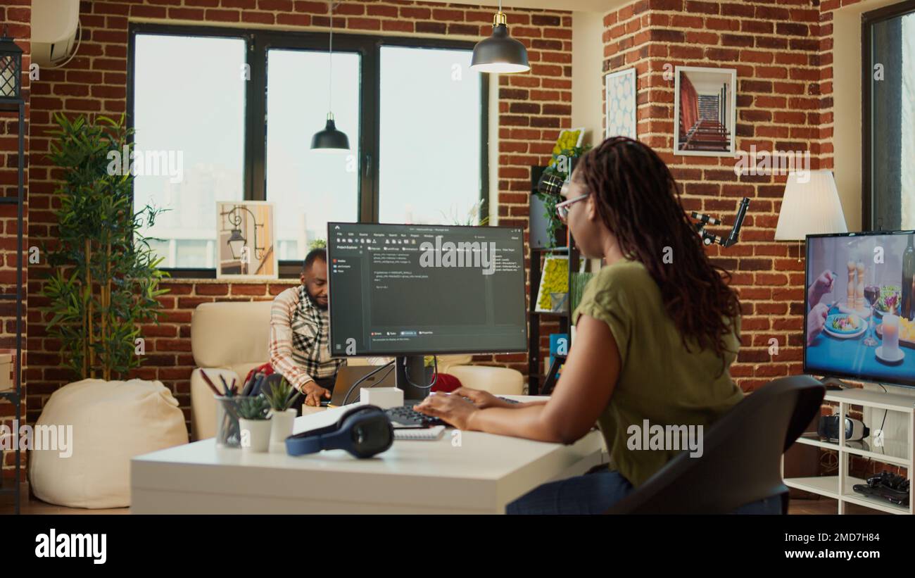 Female Developer Working On It Software Program To Create Web Database With Html Script And Code