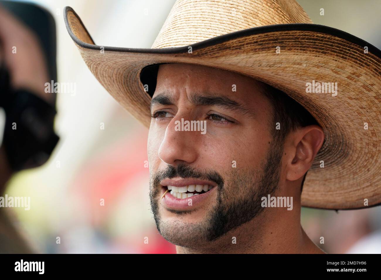 McLaren driver Daniel Ricciardo, of Australia, wears a cowboy hat ...