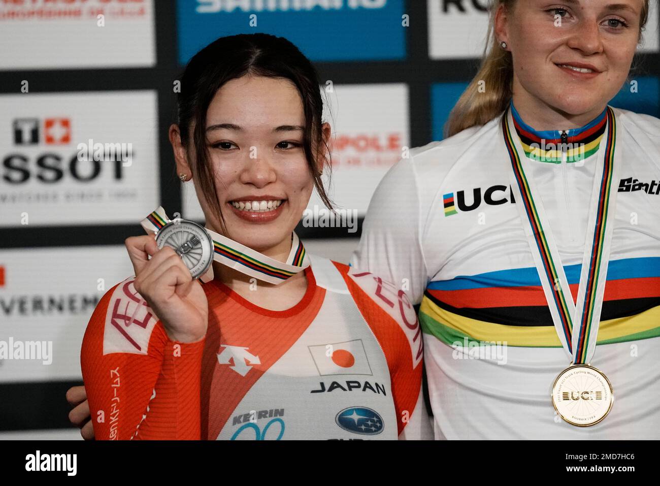 Mina Sato of Japan shows her silver medal next to Lea Sophie Friedrich ...