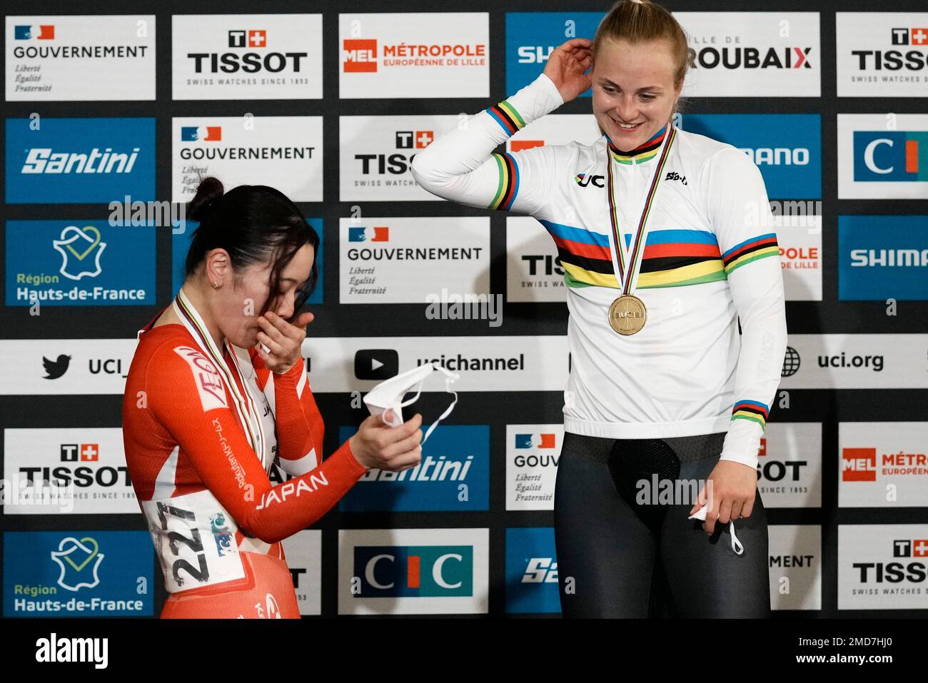 Lea Sophie Friedrich of Germany, center, with her gold medal, looks at ...
