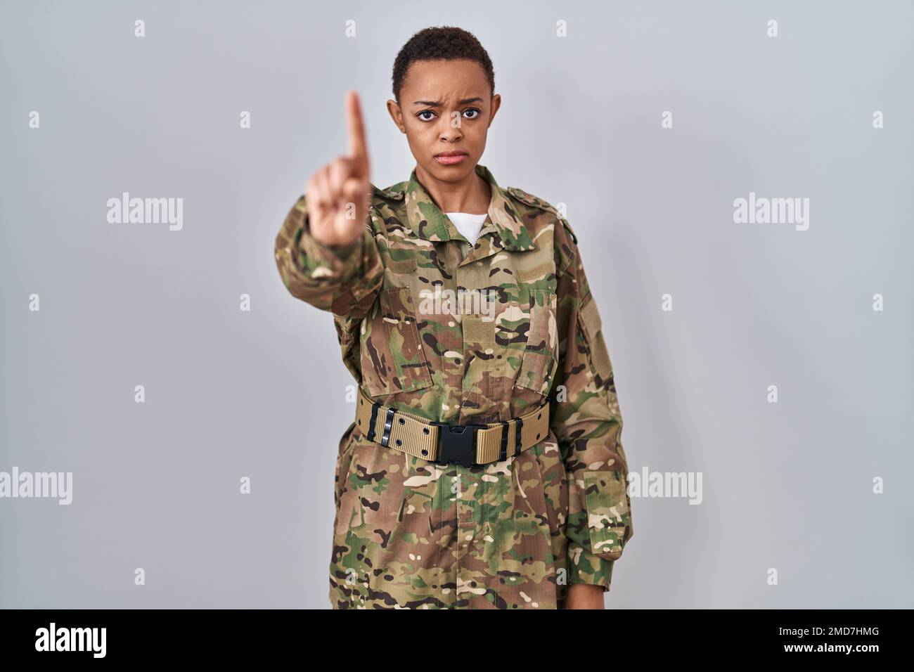 Beautiful african american woman wearing camouflage army uniform ...
