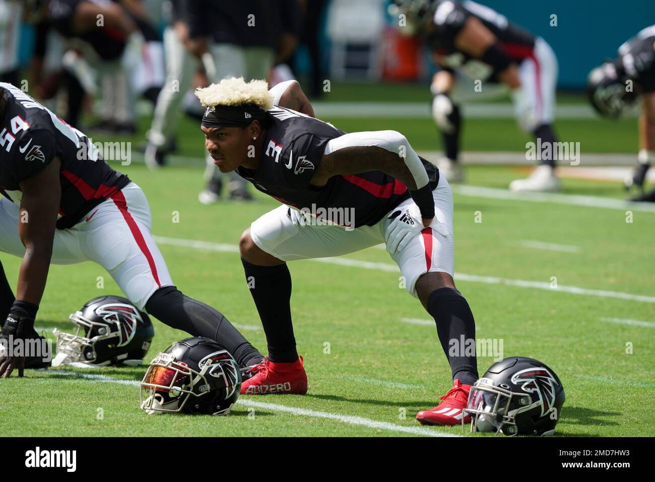 Atlanta Falcons linebacker Mykal Walker (3) stretches during warm-ups ...
