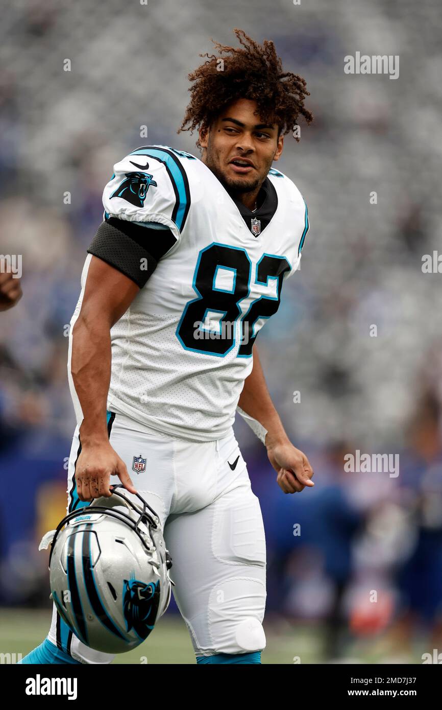 Carolina Panthers tight end Tommy Tremble (82) warms up before taking ...