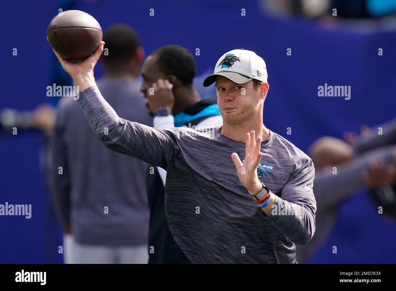 Carolina Panthers quarterback Sam Darnold throws a pass as he warms up ...