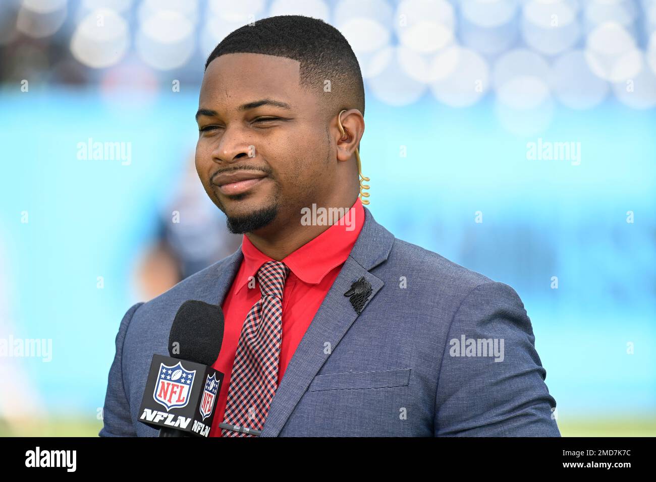 NFL Network reporter Cameron Wolfe works before an NFL football game ...