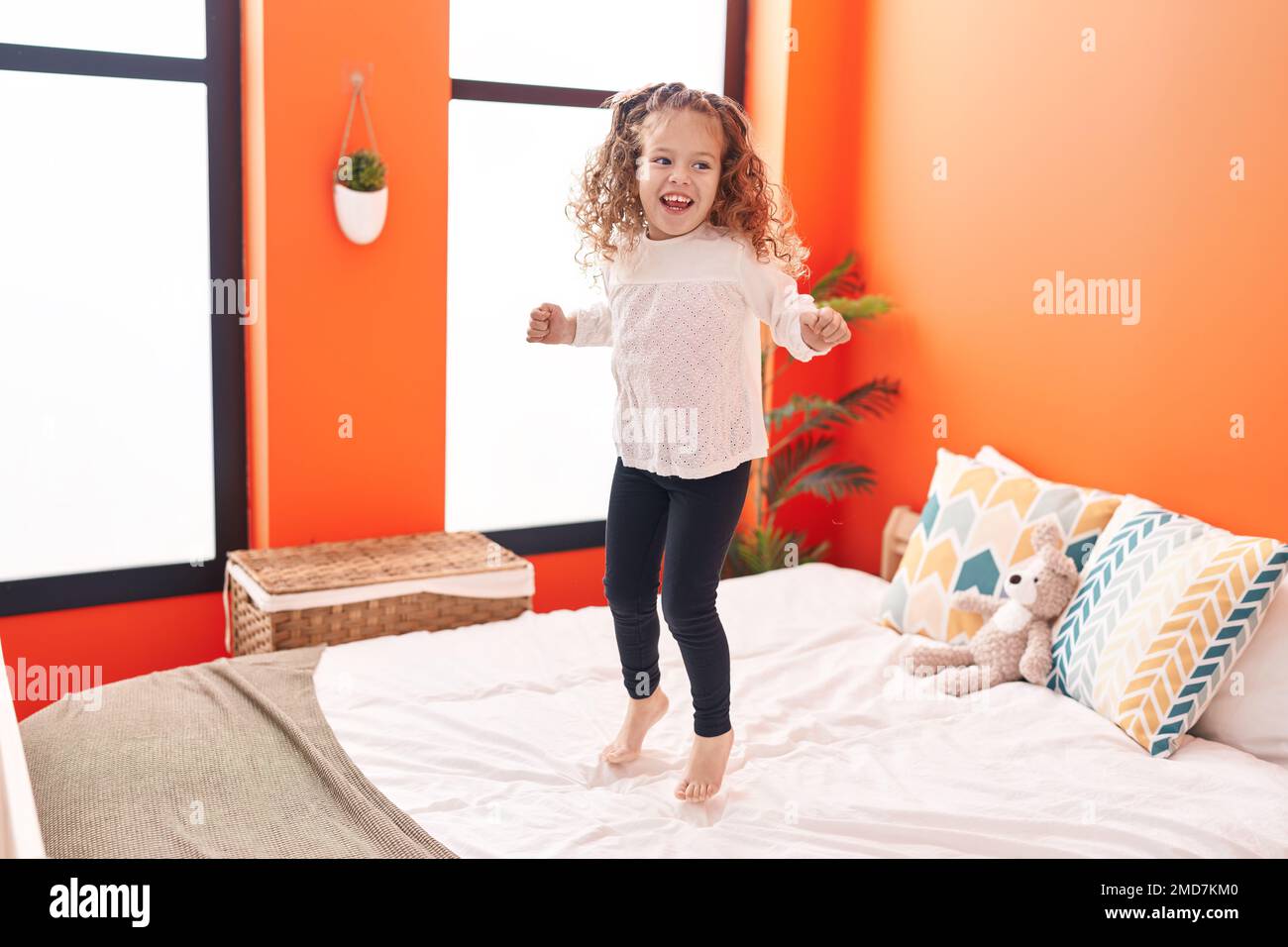 Funny baby girl jumping on hi-res stock photography and images - Alamy