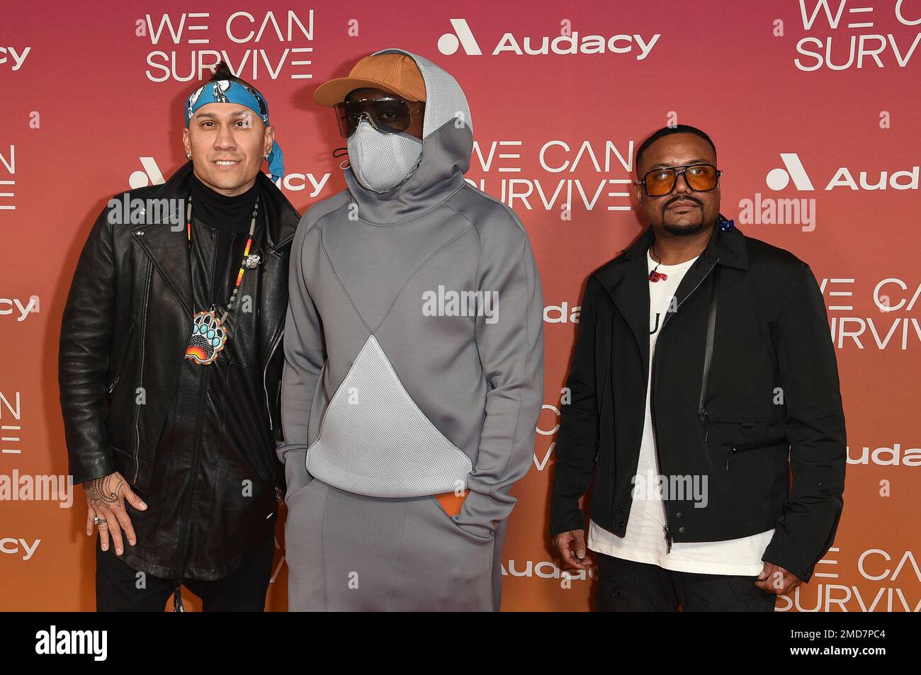 Taboo, from left, will.i.am and apl.de.ap of the Black Eyed Peas arrive ...