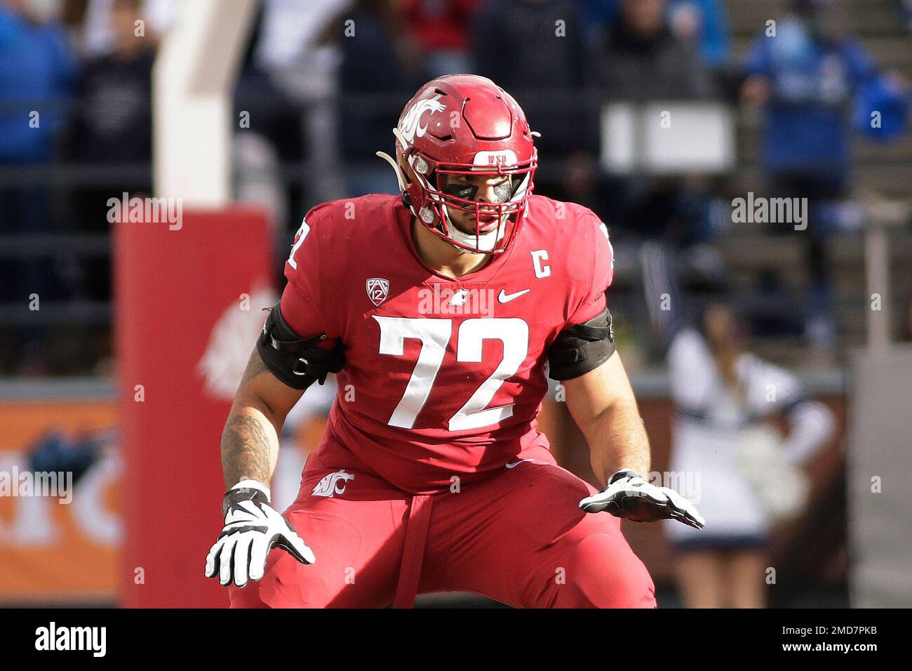 Washington State offensive lineman Abraham Lucas prepares to block ...