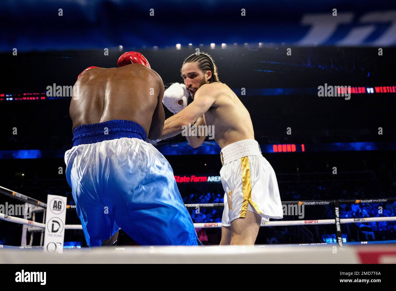 Niko Ali Walsh, grandson of Muhammad Ali, hits James Westley II during ...