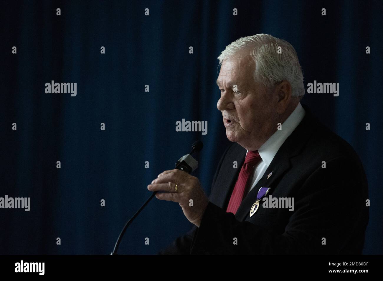 Retired Lt. Col. David Hartline speaks at his Purple Heart award ...