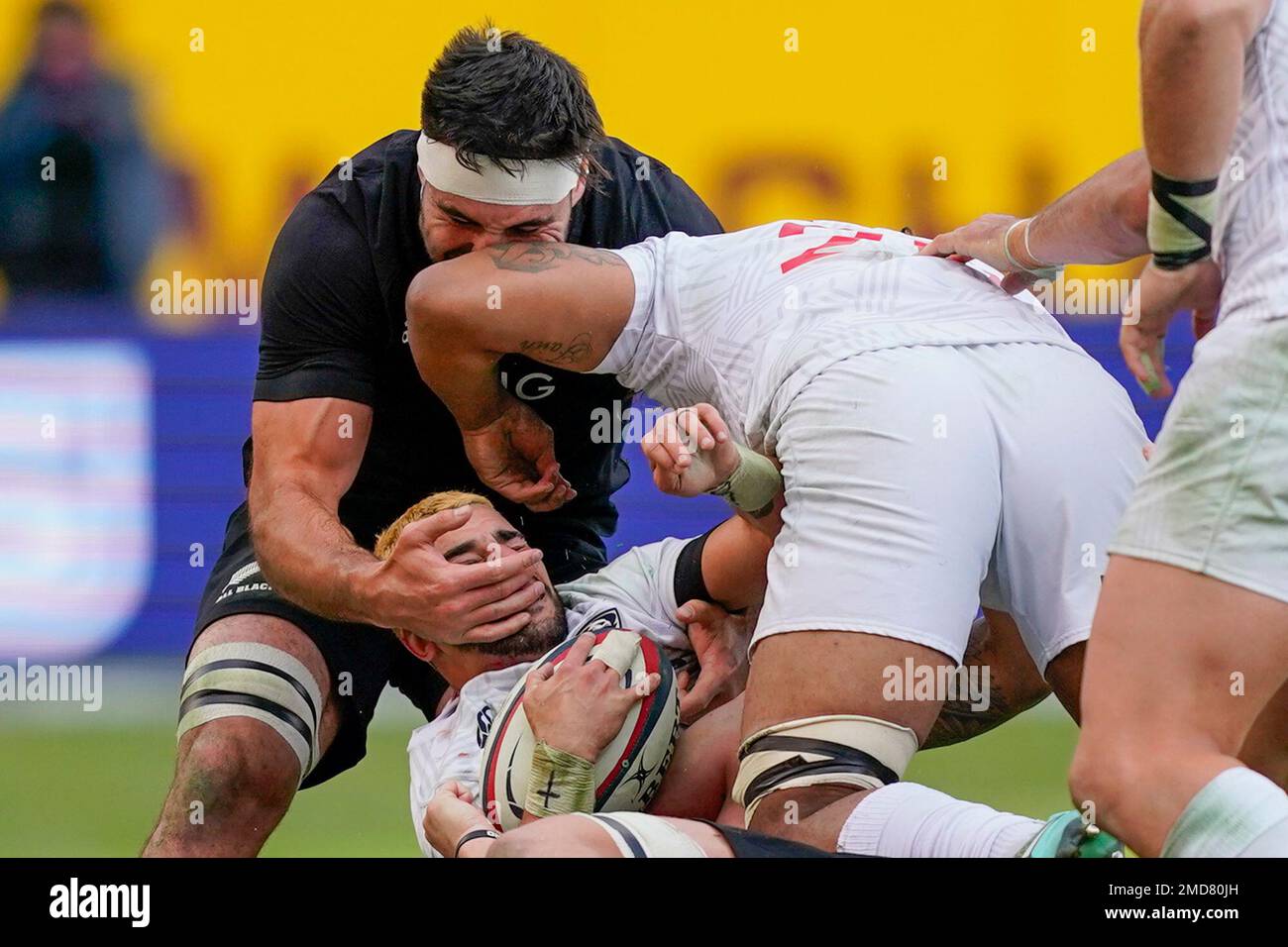 New Zealand's Luke Jacobson tackles United States' Nate Augspurger ...