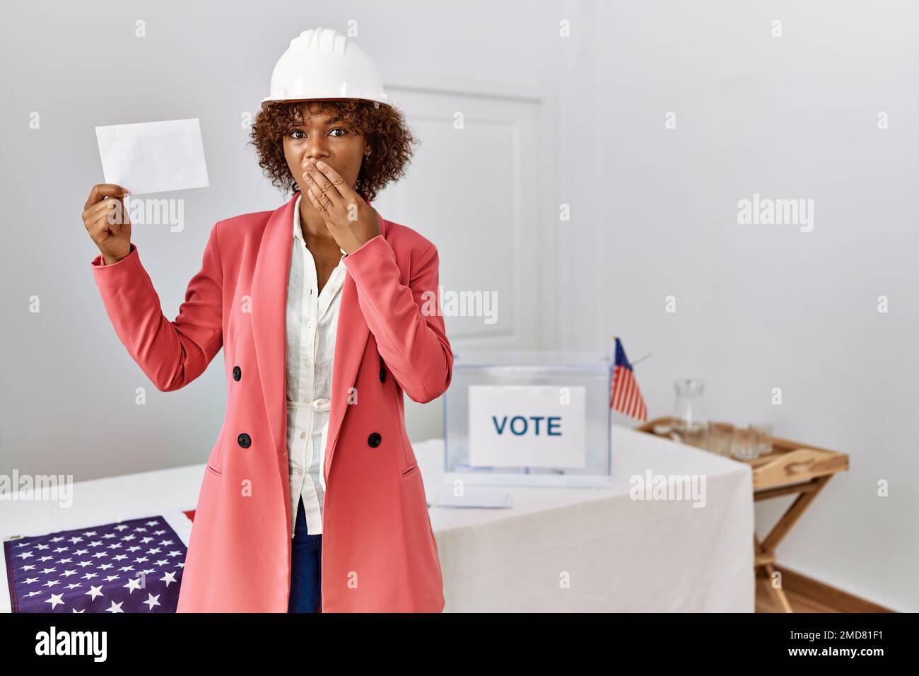 Young african american architect woman at political election holding ...