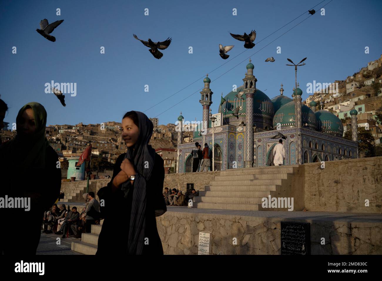 Women talk outside the Karti Sakhi Shrine in Kabul, Afghanistan ...