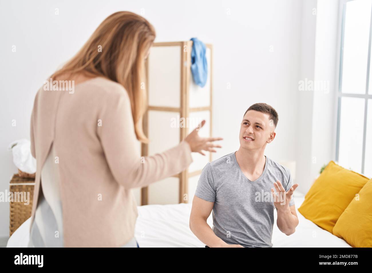 Man and woman mother and son arguing at bedroom Stock Photo - Alamy