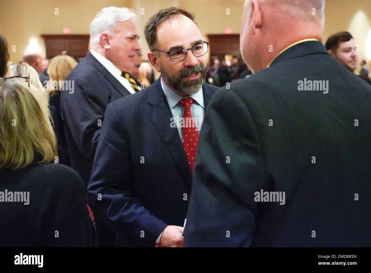 In this photo made on Friday, Oct. 22, 2021, Judge Kevin Brobson greets ...