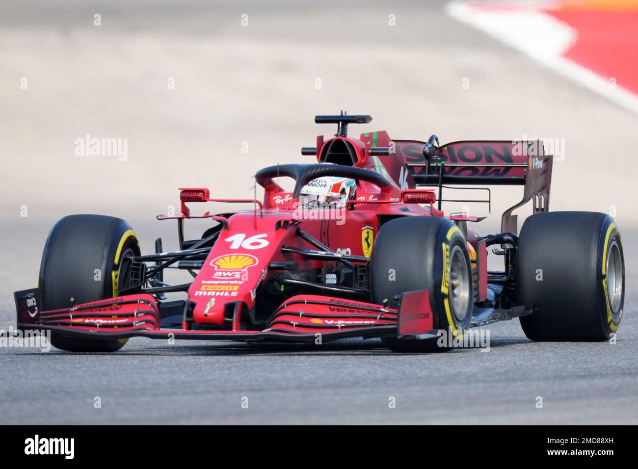 Ferrari driver Charles Leclerc, of Monaco, drives into a turn during a practice session for the ...