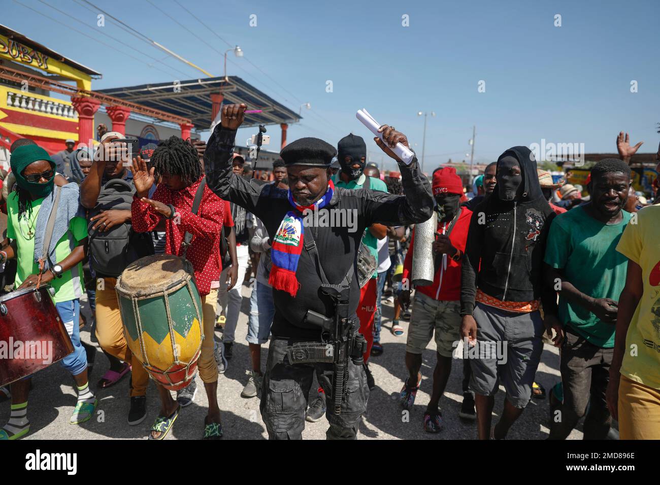 Barbecue, the leader of the "G9 and Family" gang, leads a march against ...