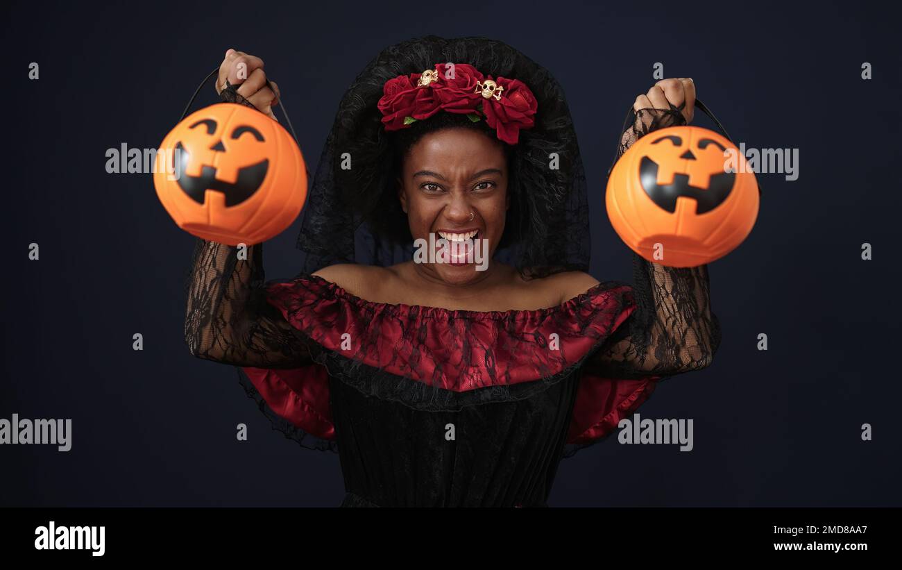 African american woman wearing katrina costume holding halloween ...