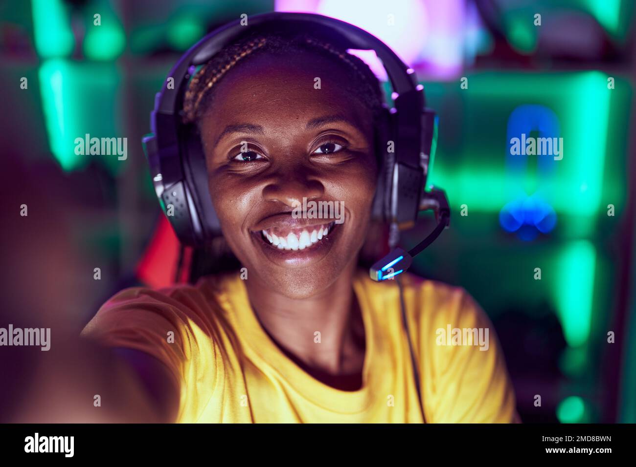 African american woman streamer smiling confident make selfie by camera ...