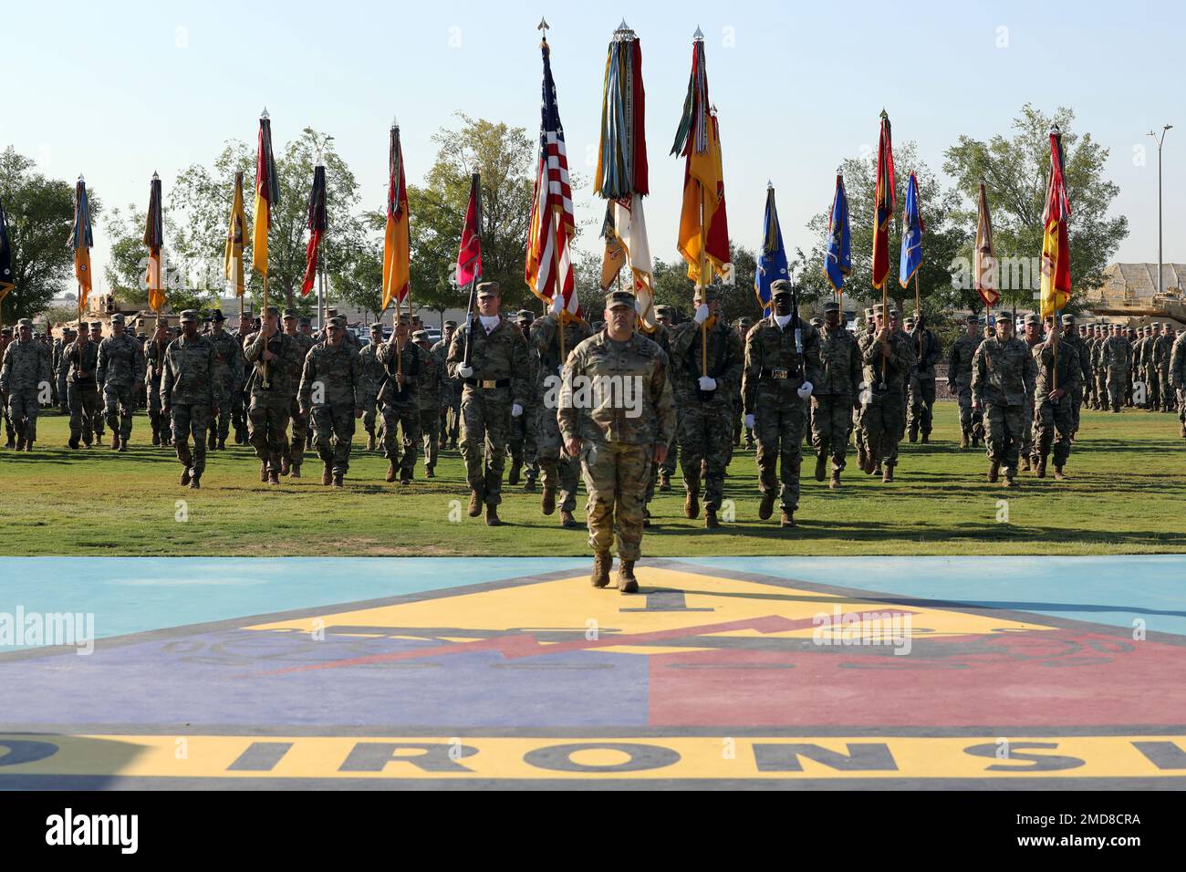 The 1st Armored Division color guard and brigade and battalion guidon ...