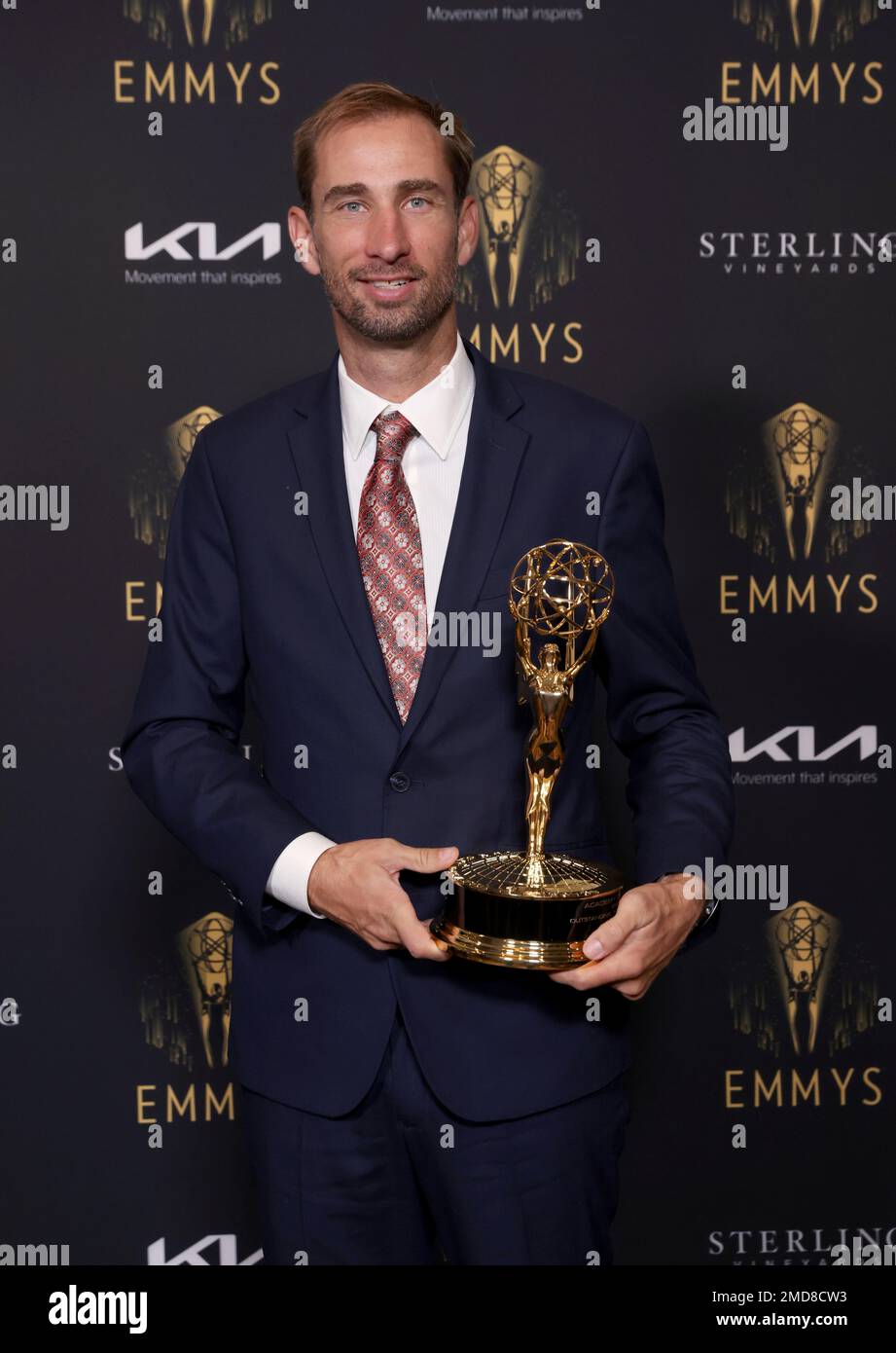 Dennis Scheftner, of Teradek Bolt 4K, poses with their Engineering Emmy ...